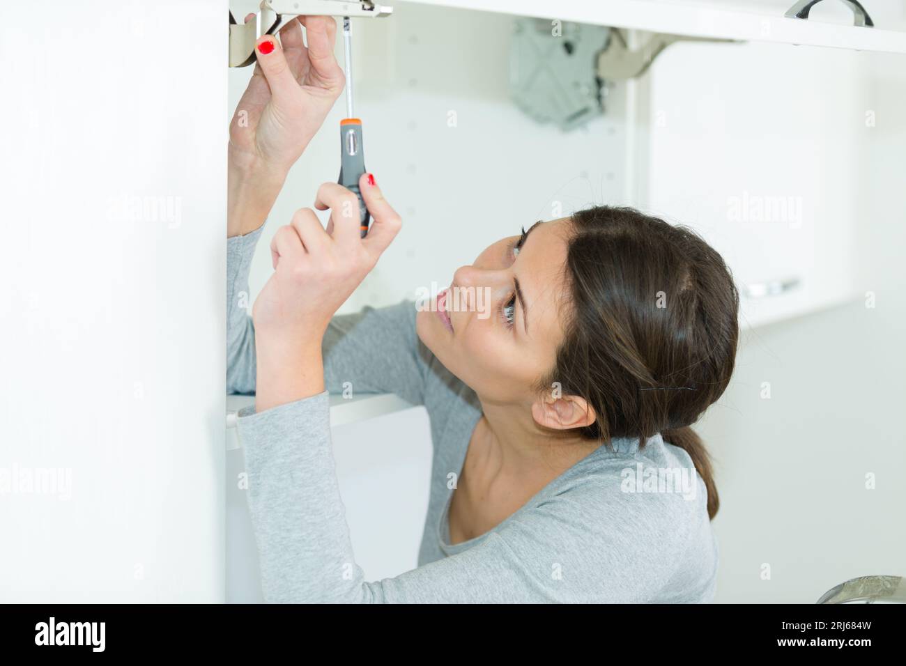 Using screw driver hi-res stock photography and images - Alamy