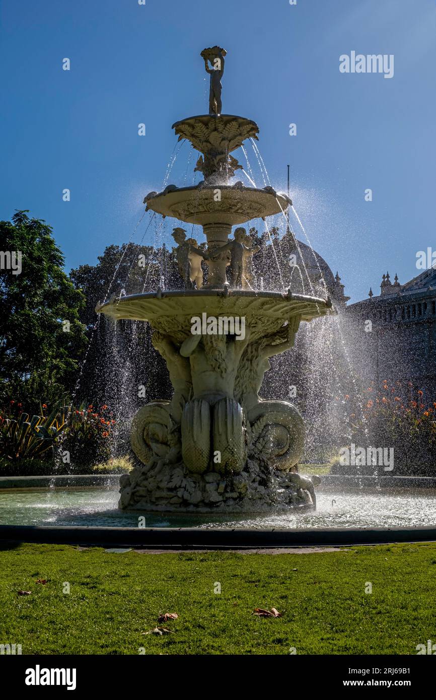 A vibrant fountain in front of the iconic Royal Exhibition Building in ...