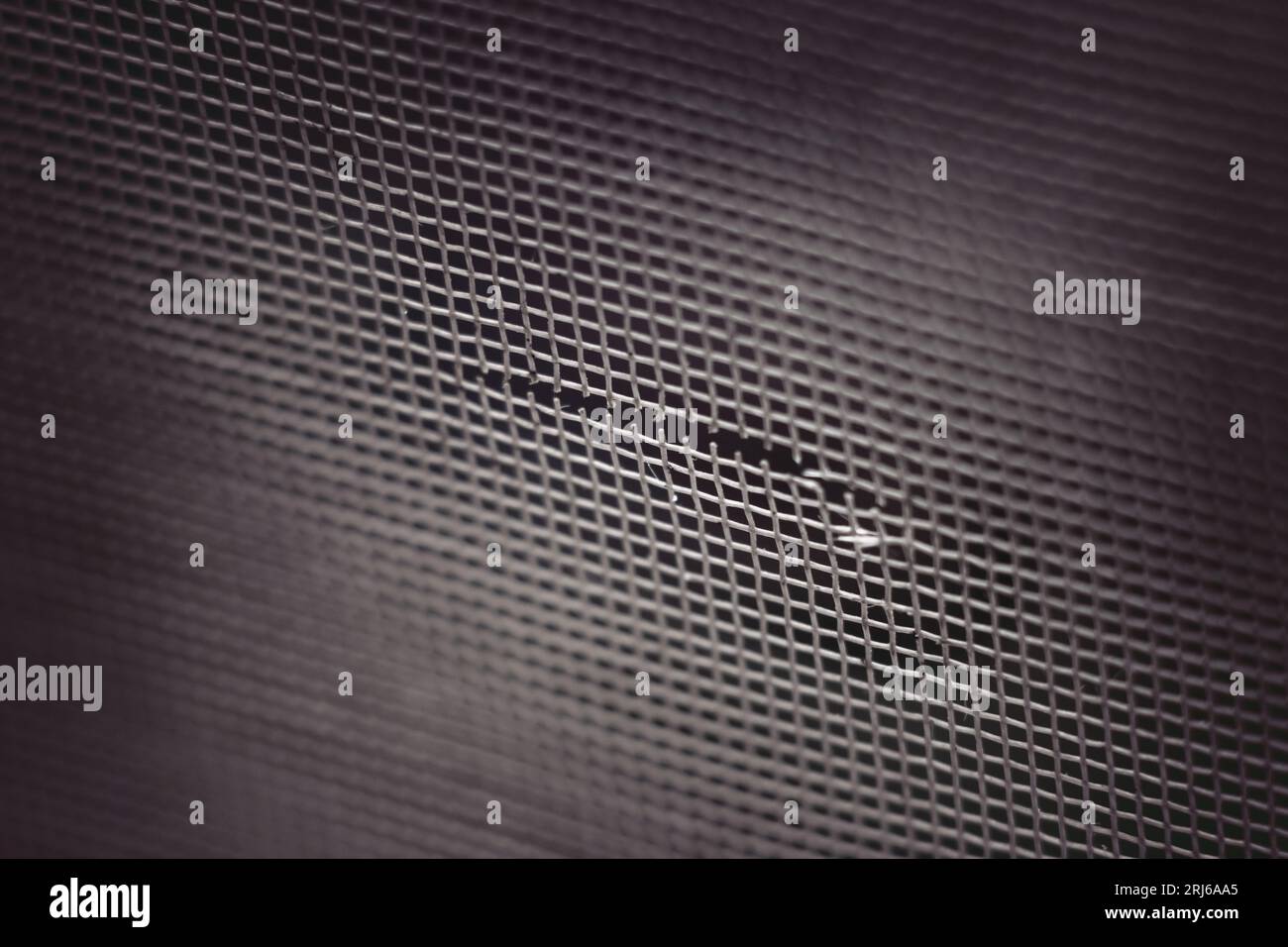 punctured fly net detail in full frame image Stock Photo - Alamy