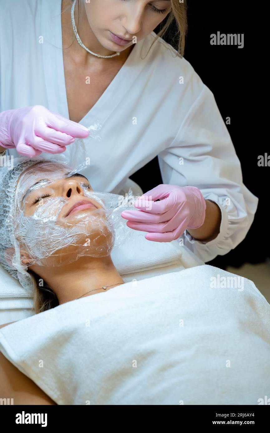 Beauty procedure for young woman skin. Cure of face skin in cosmetology ...