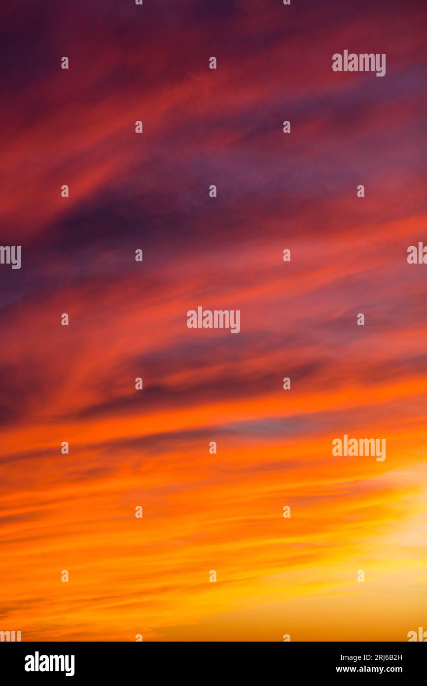 A breathtaking view of a sunset with wispy clouds in the sky Stock ...