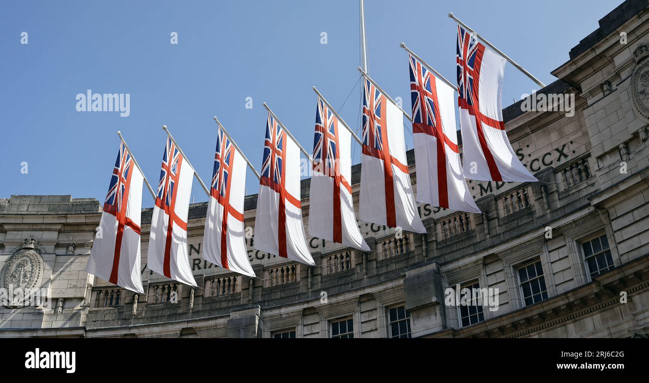 A collection of British flags flying proudly outside the Admiralty Arch ...