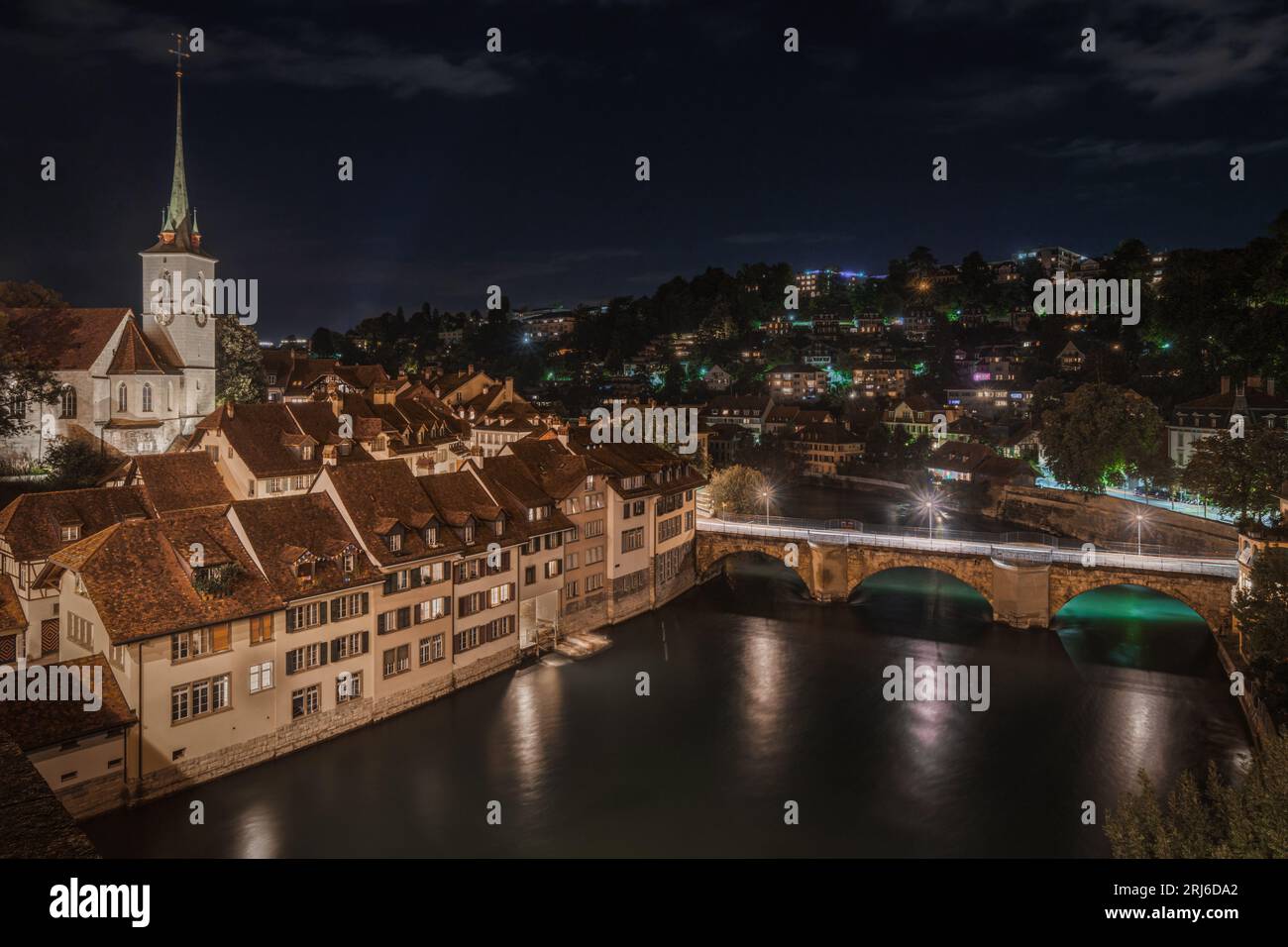 A scenic night aerial view of Bern's old town seen from Rose Garden ...