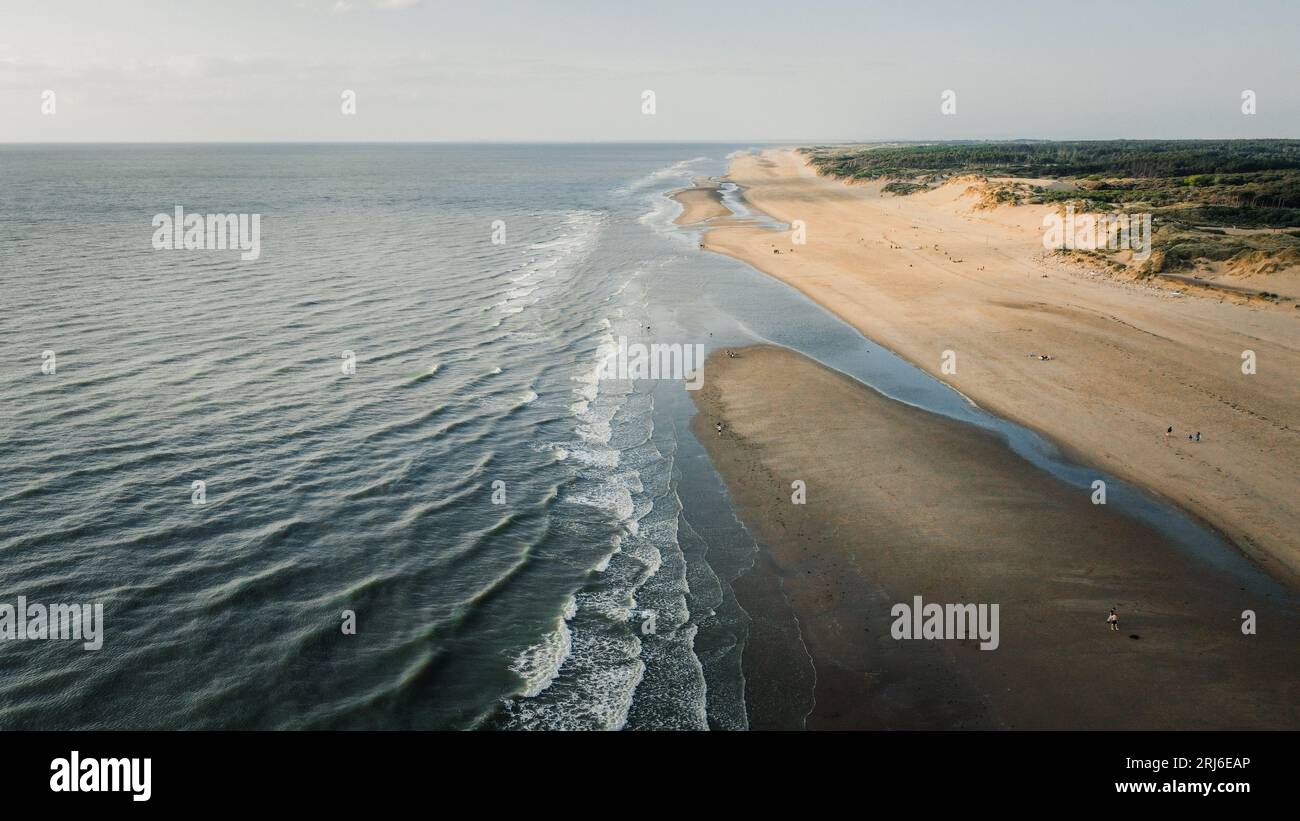 An aerial view of Formby Beach with white sand and blue ocean Stock ...