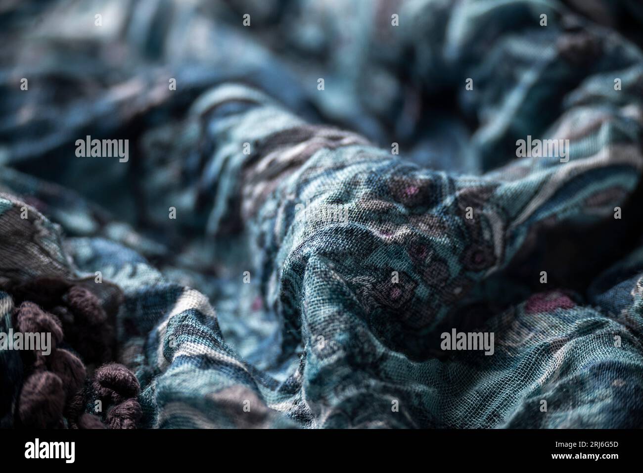 Wrinkled blue textured cloth, fashion industry Stock Photo - Alamy