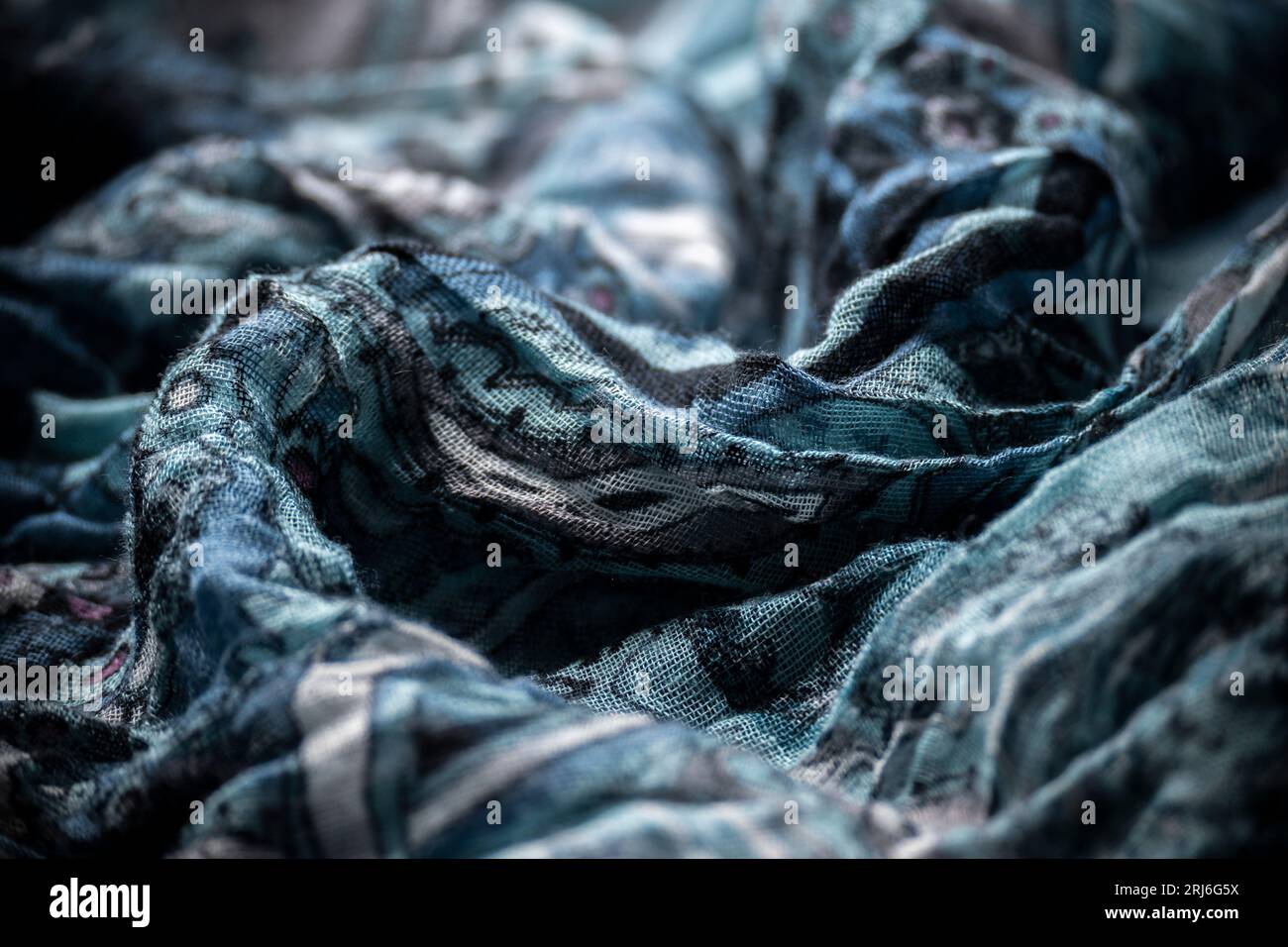 Wrinkled blue textured cloth, fashion industry Stock Photo - Alamy