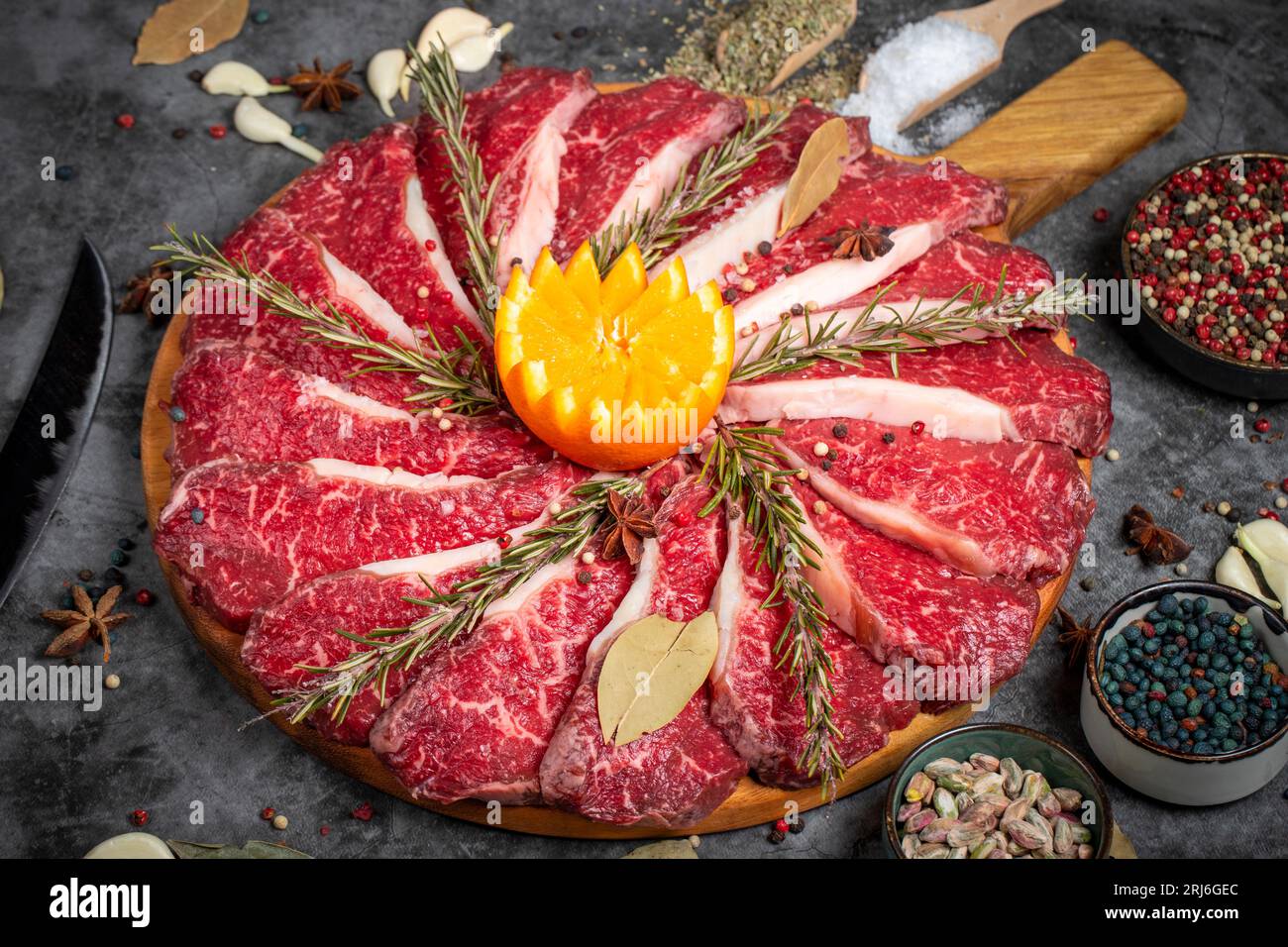 Raw meat ribeye steak entrecote. Raw ribeye on dark background. Butcher ...