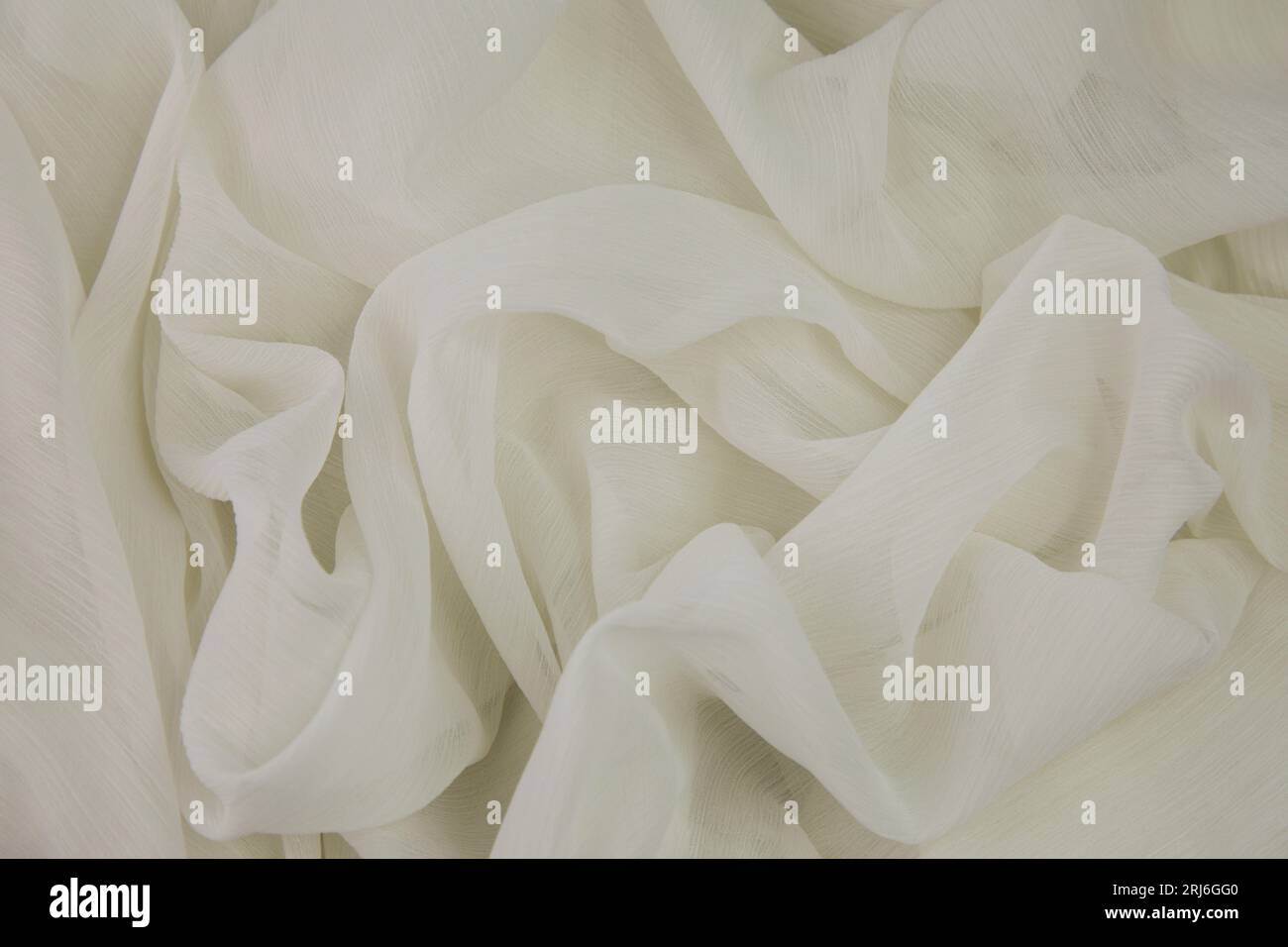 Folds of white dress fabric hi-res stock photography and images - Alamy