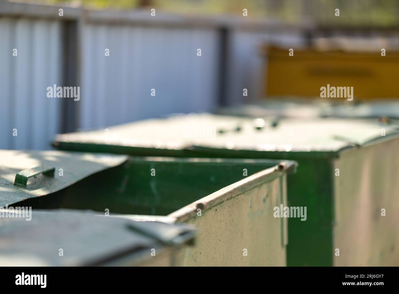 Row of metal trash cans hi-res stock photography and images - Alamy