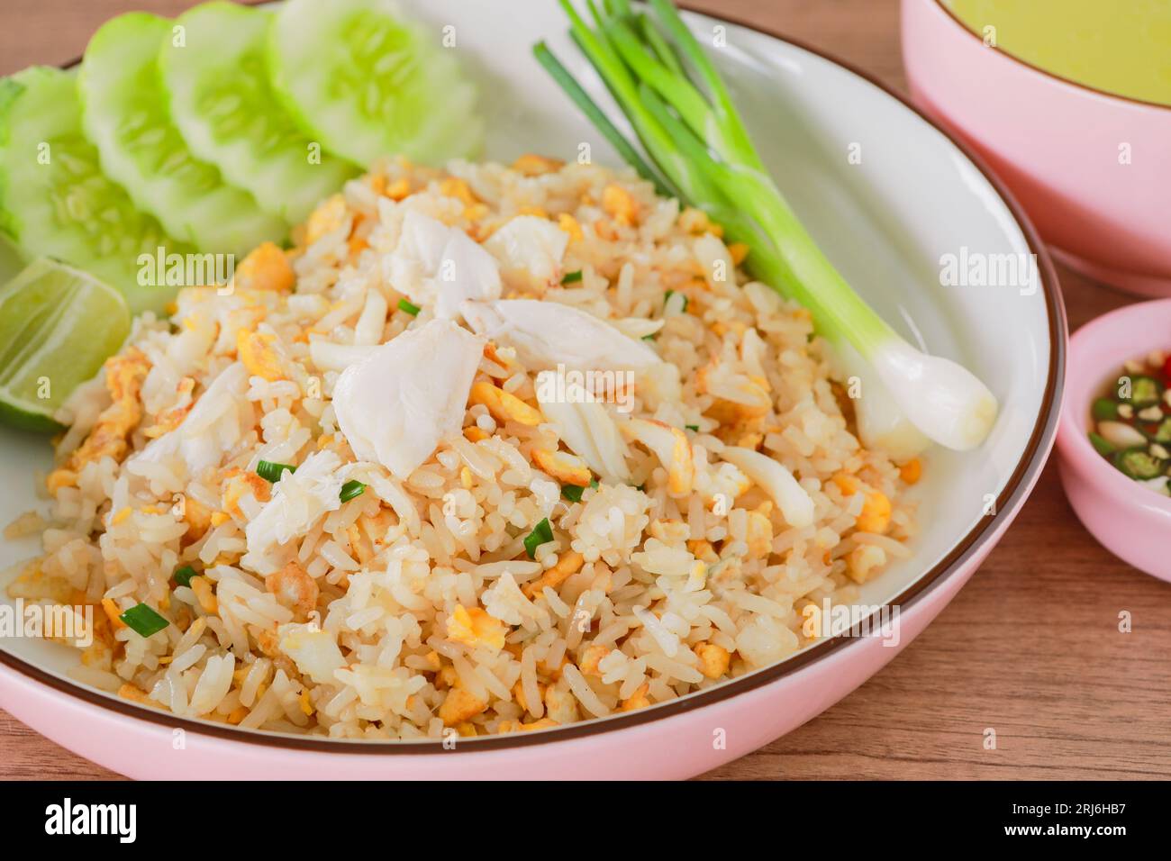 crab meat fried with rice ready in dish for eating Stock Photo - Alamy