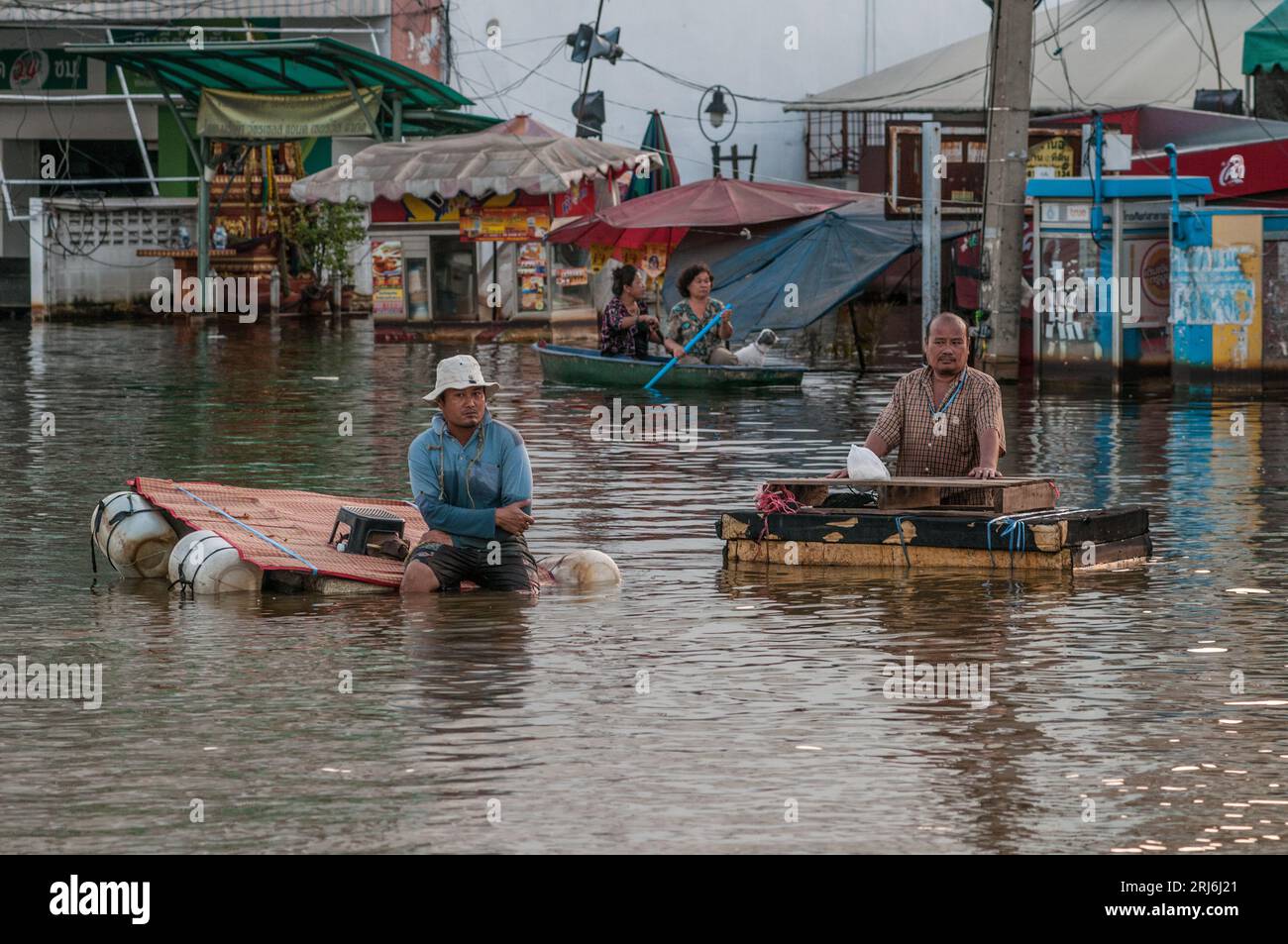 After weeks of flooding, boats & makeshift rafts have become the main ...
