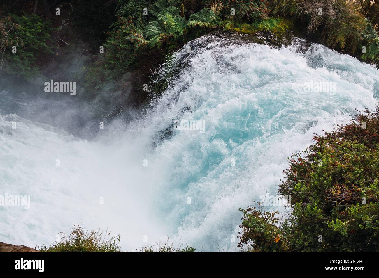 A landscape of Huka Falls surrounded by greenery in New Zealand Stock ...