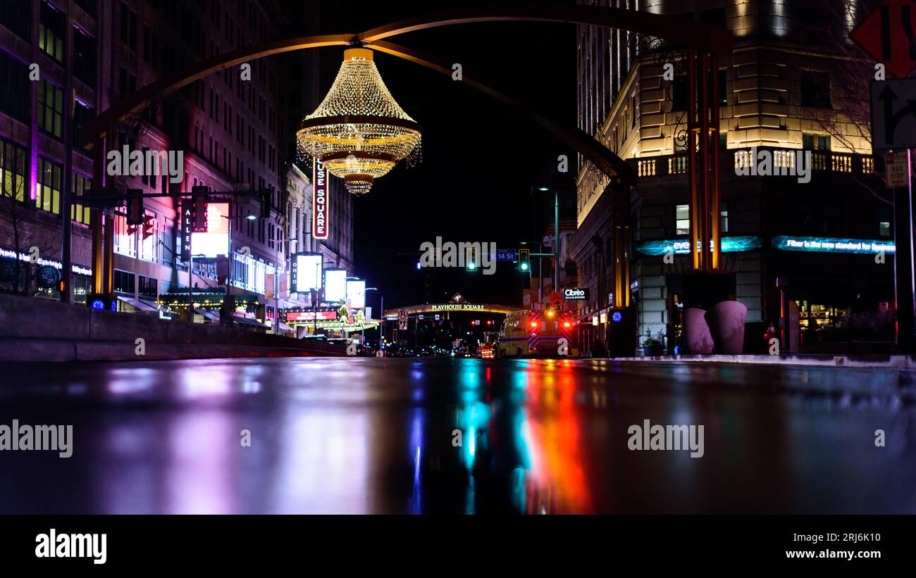 The Cleveland Downtown surrounded by neon lights at night in Ohio Stock ...