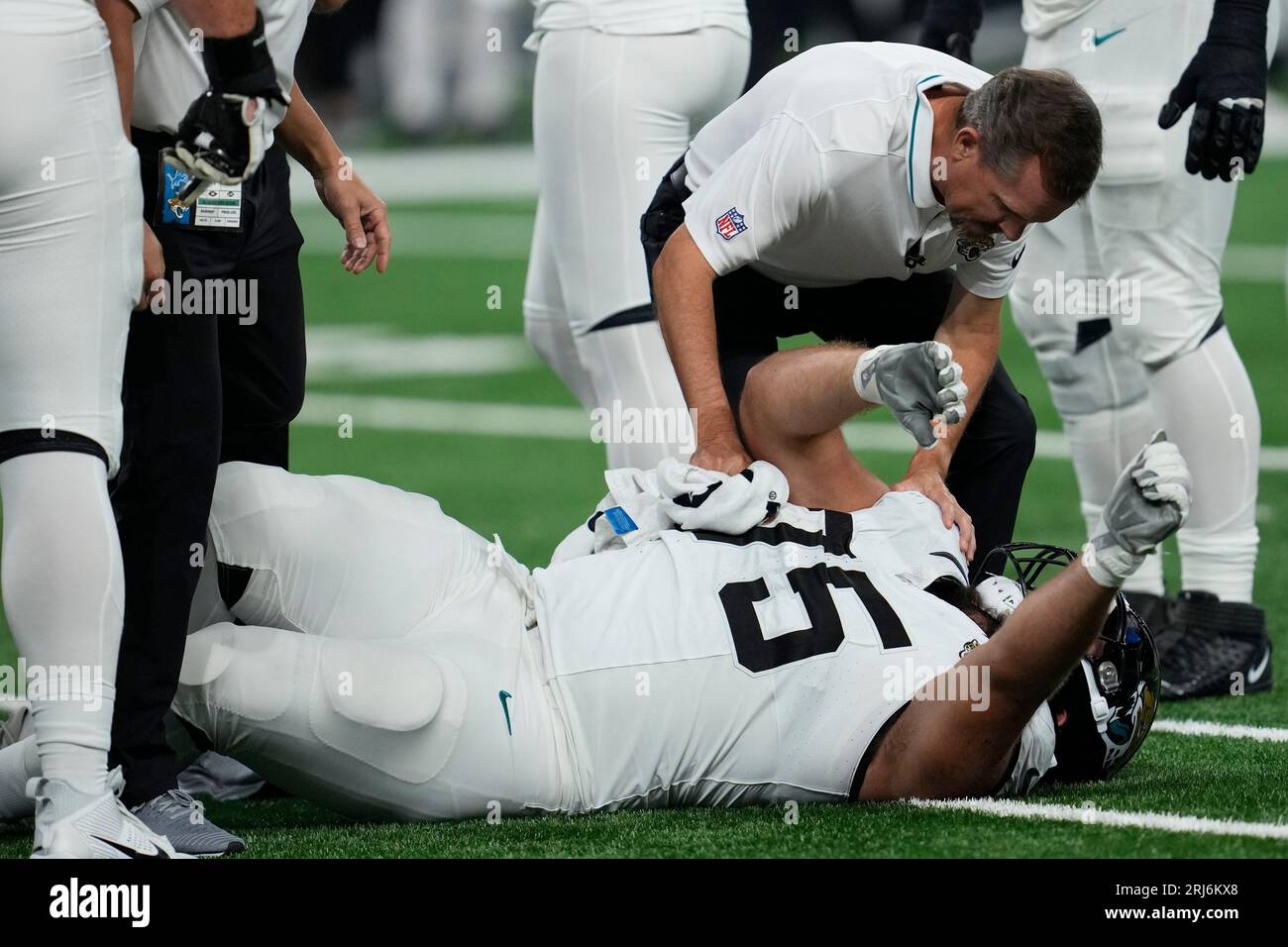 Jacksonville Jaguars offensive tackle Cooper Hodges (75) lies injured ...