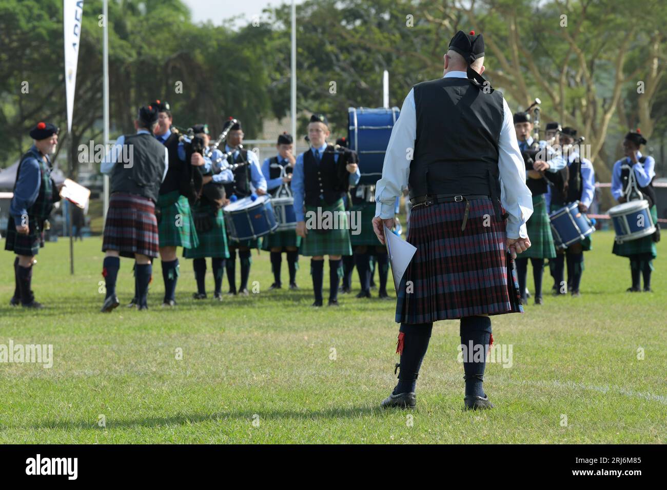 Rear view adult male judging Scottish music competition, 60th Annual ...