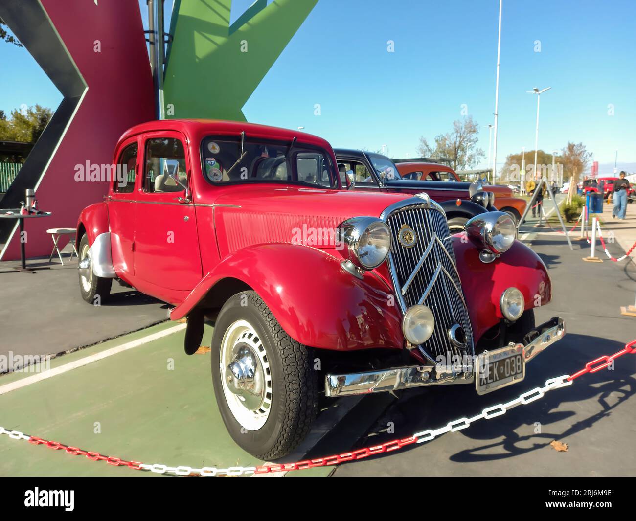 old red elegant 1940s Citroen Traction Avant Legere in a park. Expo ...