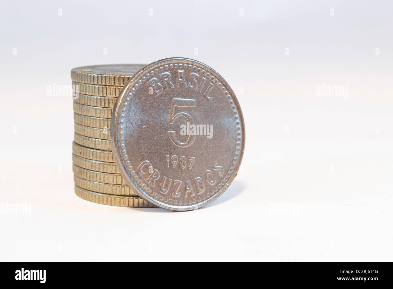A stack of Brazilian cruzado coins on the white background Stock Photo ...