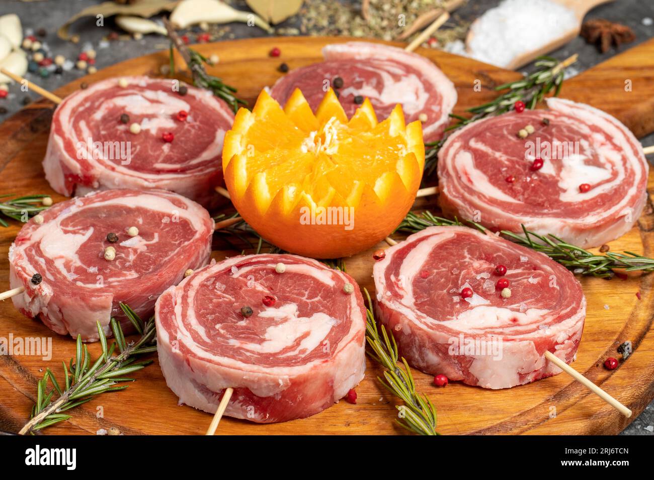 Lamb stew. Raw lamb beyti kebab on dark background. Butcher products ...