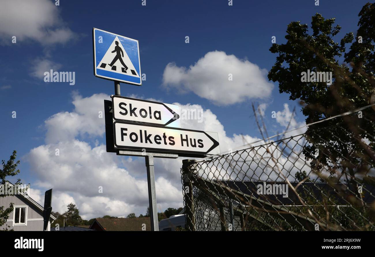 Signs and symbols, school and Folkets hus signs Stock Photo - Alamy