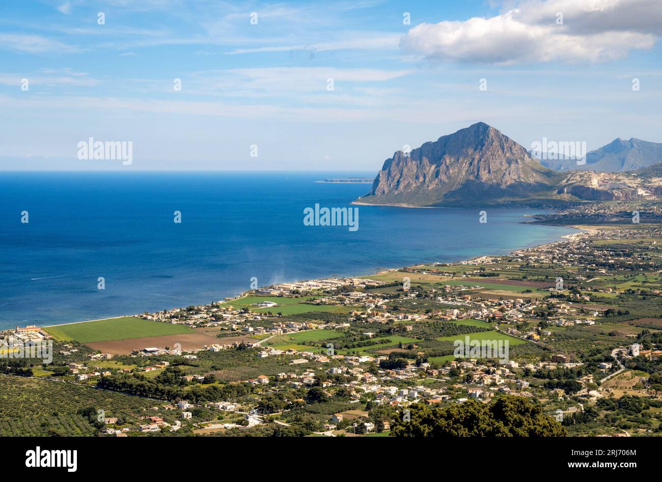 A wide view from Erice in Sicily down to the blue sea, beach, villages ...