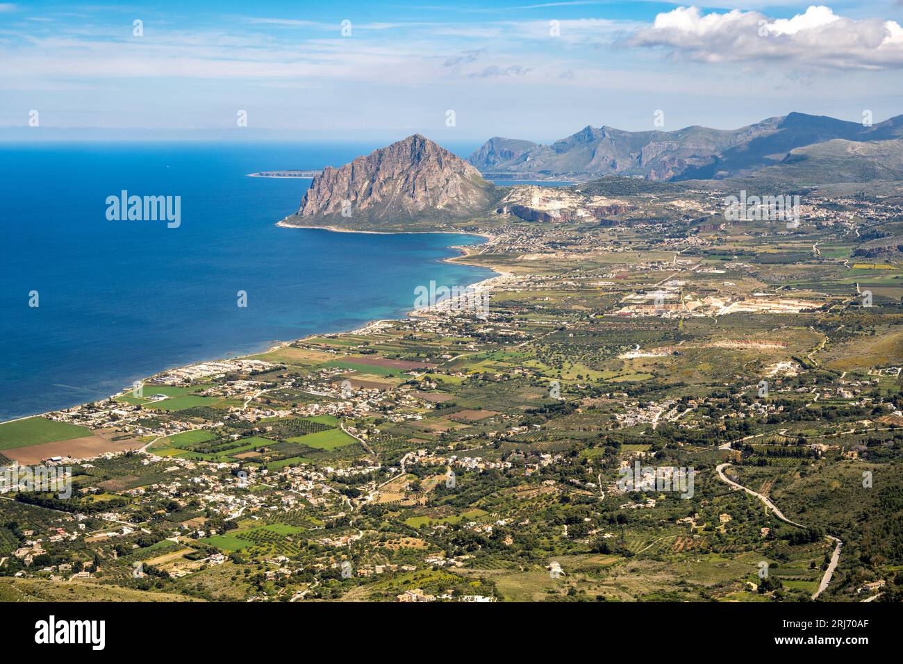 A wide view from Erice in Sicily down to the blue sea, beach, villages ...