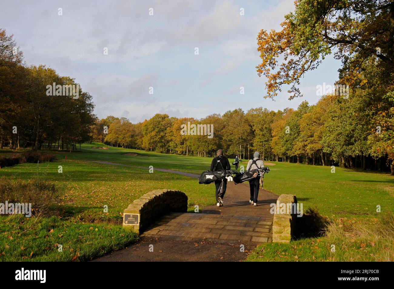 Two golfers walking across golf hi-res stock photography and images - Alamy