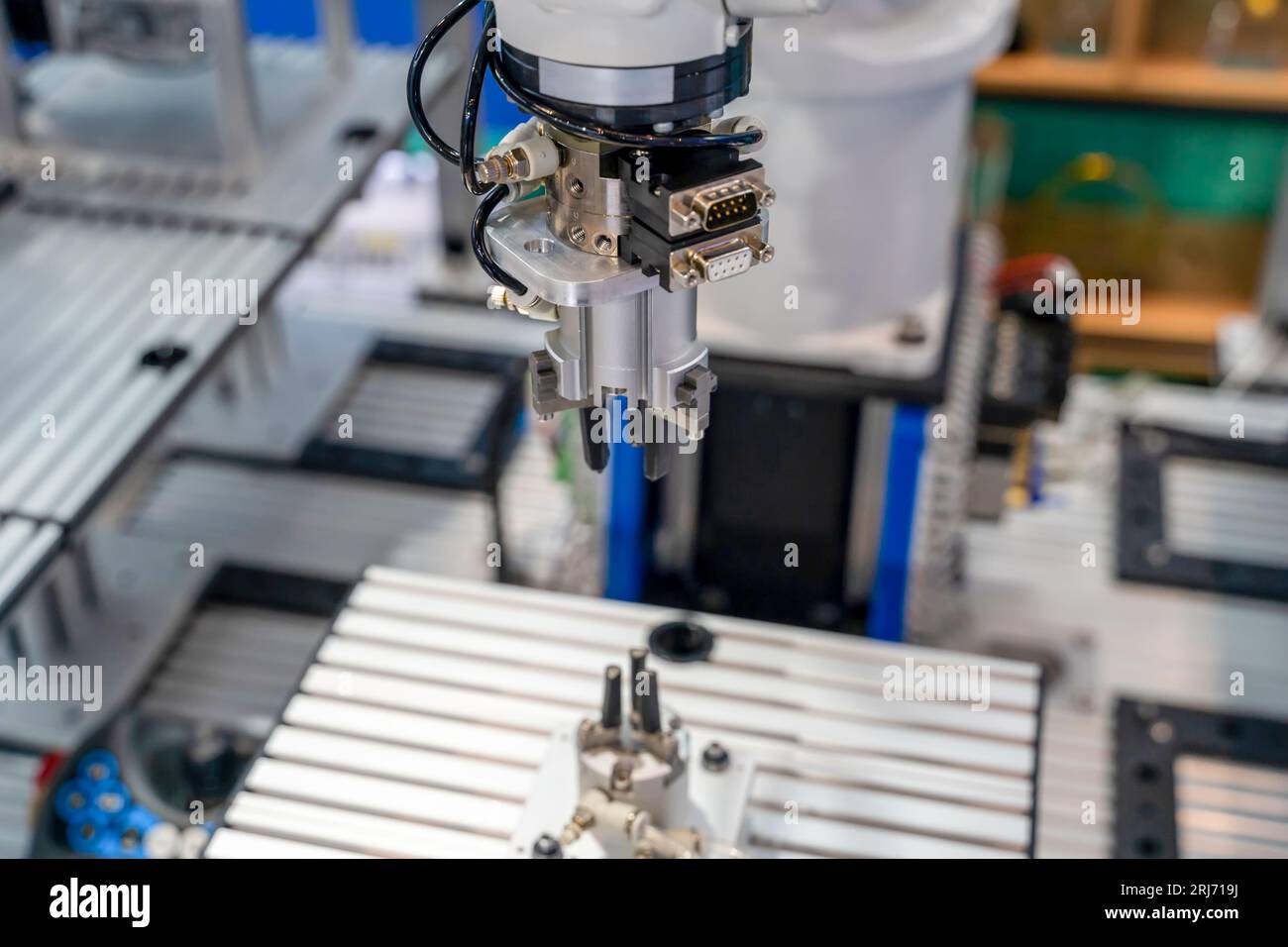 closeup view of automatic robot arm in workshop with details in factory ...