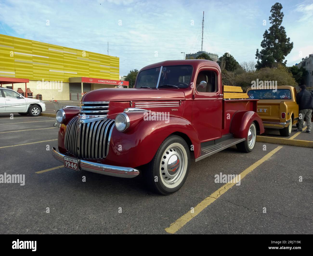 old red 1946 Chevrolet Chevy AK series 250 pickup truck in a parking ...