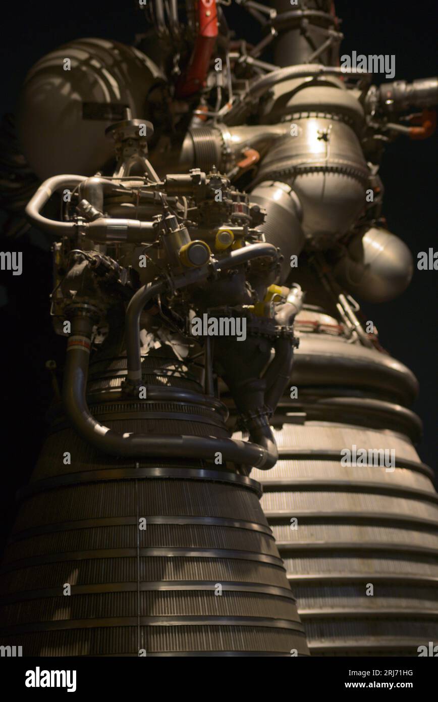 A detailed view of the engine of an aircraft, enclosed in a transparent ...