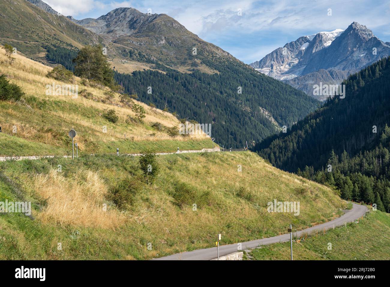 The road through the majestic Swiss Alps to the Col du Grand St Bernard ...