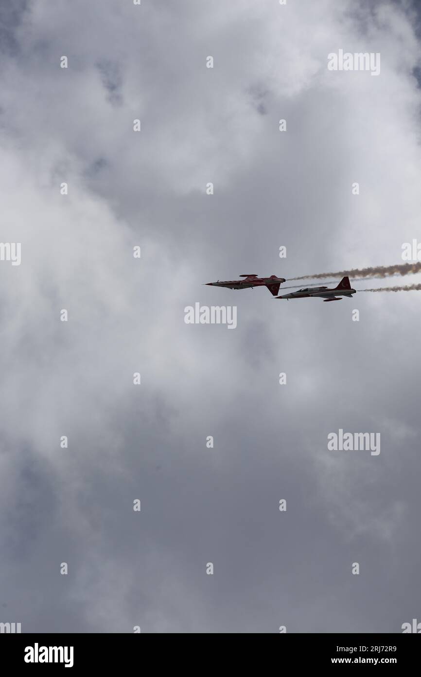 Jet fighters in cloud. Fighter planes in airshow on blue sky. et planes ...