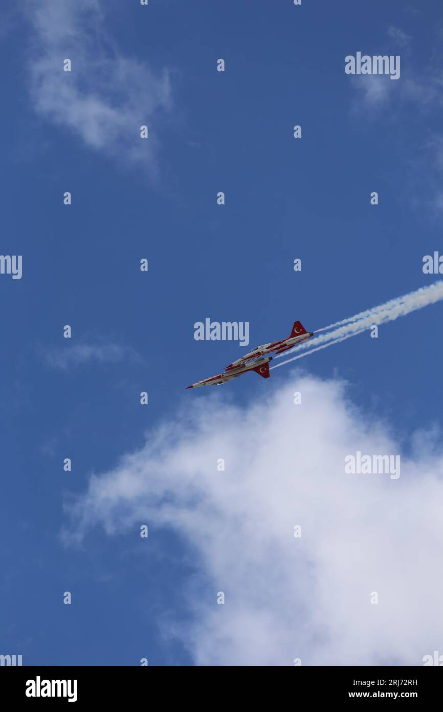 Jet fighters in cloud. Fighter planes in airshow on blue sky. et planes ...