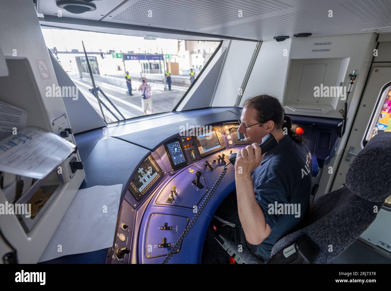 21 August 2023, Saxony, Chemnitz: Railcar driver Marcell Pellot sits in ...