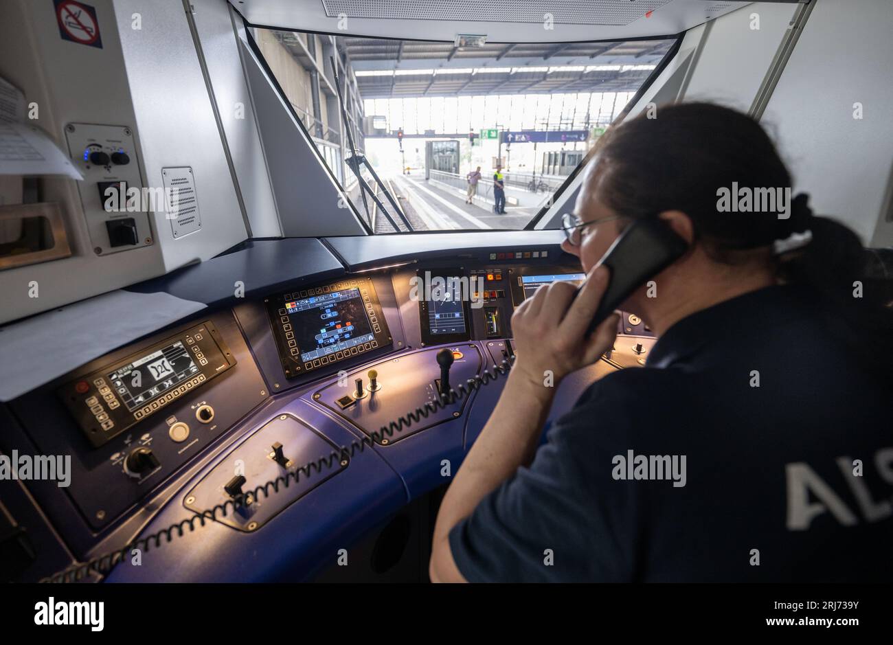21 August 2023, Saxony, Chemnitz: Railcar driver Marcell Pellot sits in ...