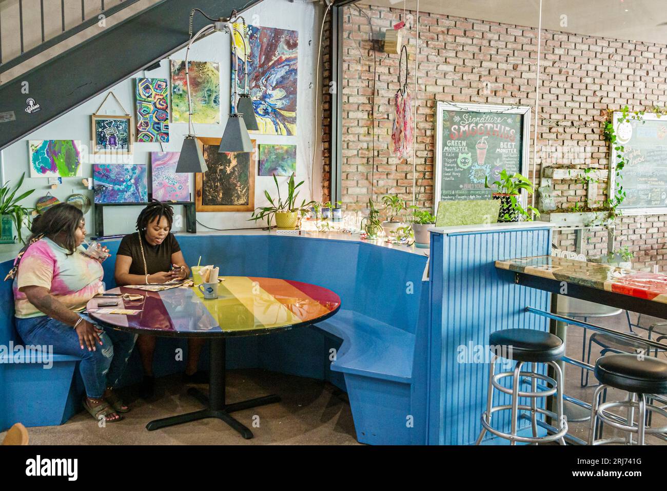 Large booth table artwork paintings hi-res stock photography and images ...