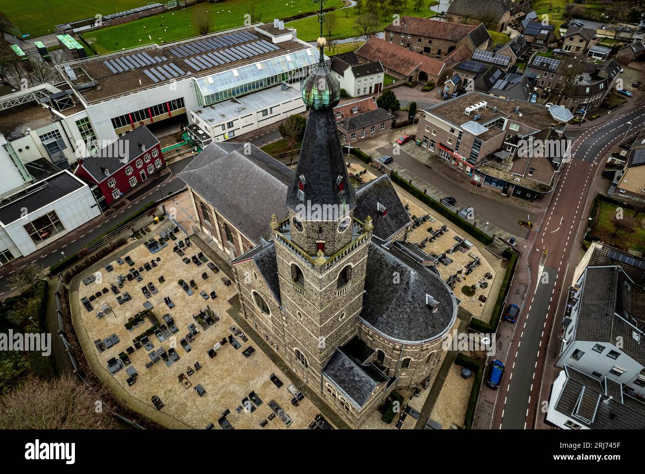 Aerial view of a quaint town square surrounded by traditional, pastel ...
