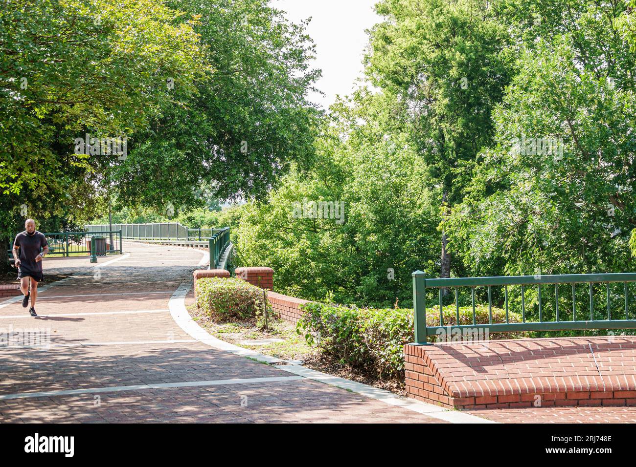 Augusta Georgia,Oglethorpe Park Riverwalk,along Savannah River,jogger ...