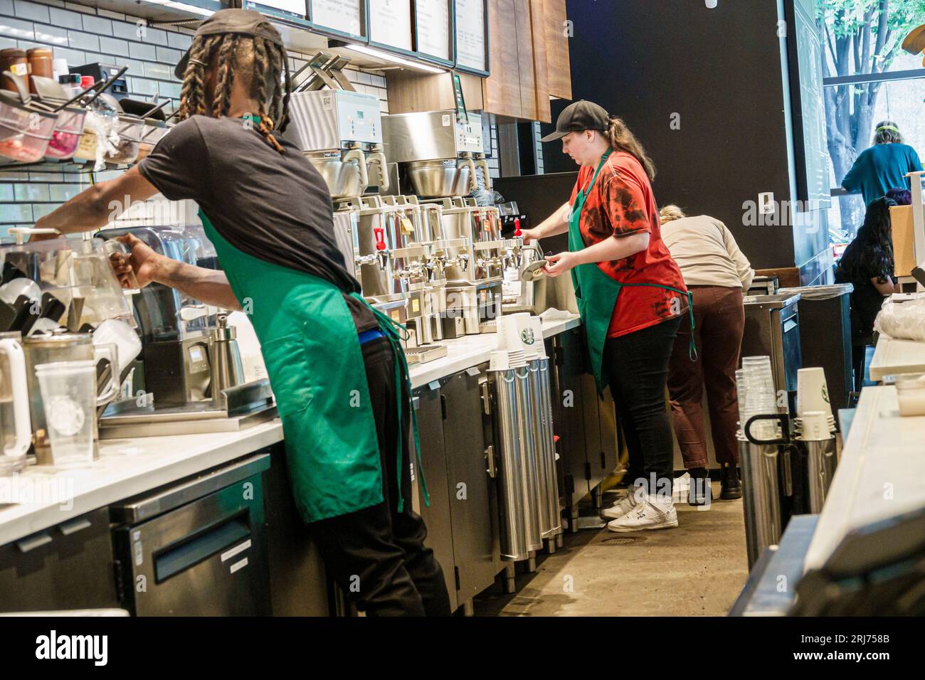 Charlotte North Carolina,Starbucks Coffee,baristas behind counter,Black ...