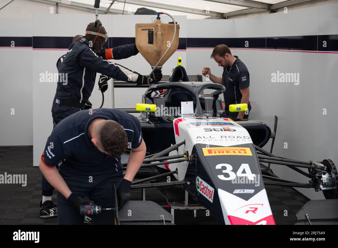 A Tatuus T-318 formula 3 single seater racing car in the pits Stock ...