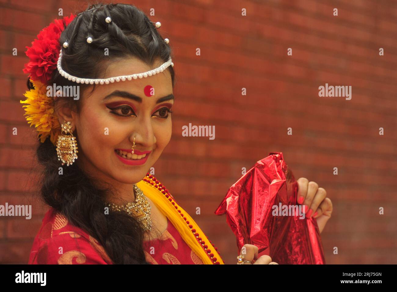 A programme marking Pahela Falgun at the Institute of Fine Arts, Dhaka University, where People ...