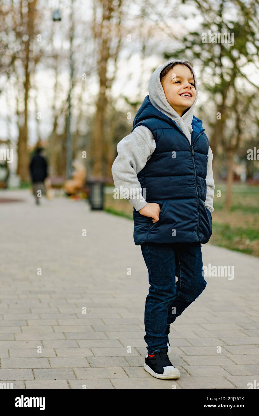 Funny smiling boy in the street portrait Stock Photo - Alamy