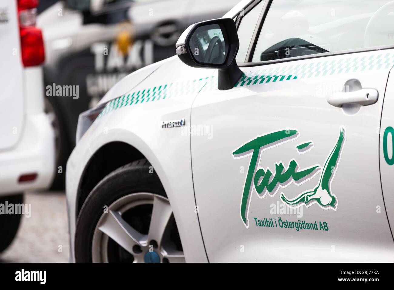 Signs and symbols, taxicabs in a taxi park, Linköping, Sweden Stock ...