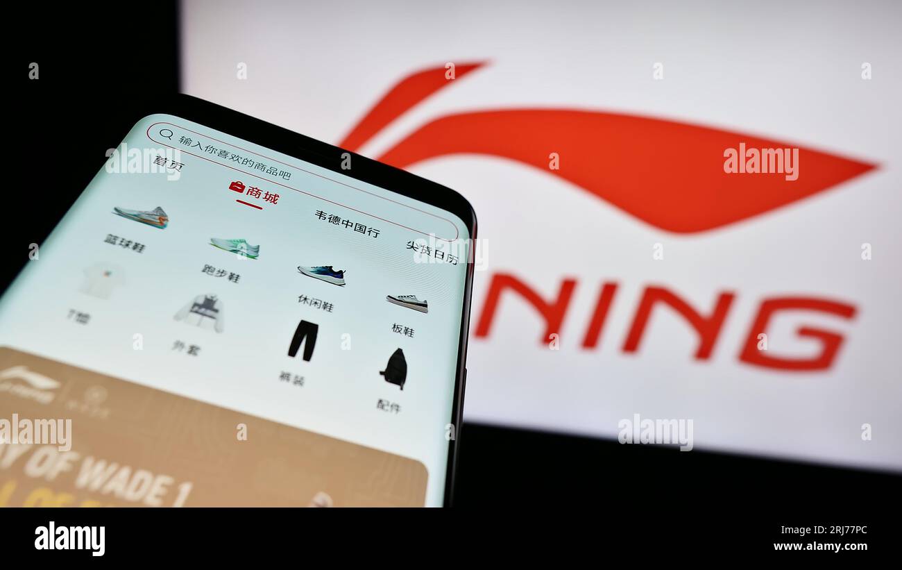 Mobile phone with webpage of Chinese company Li-Ning Company Limited on ...