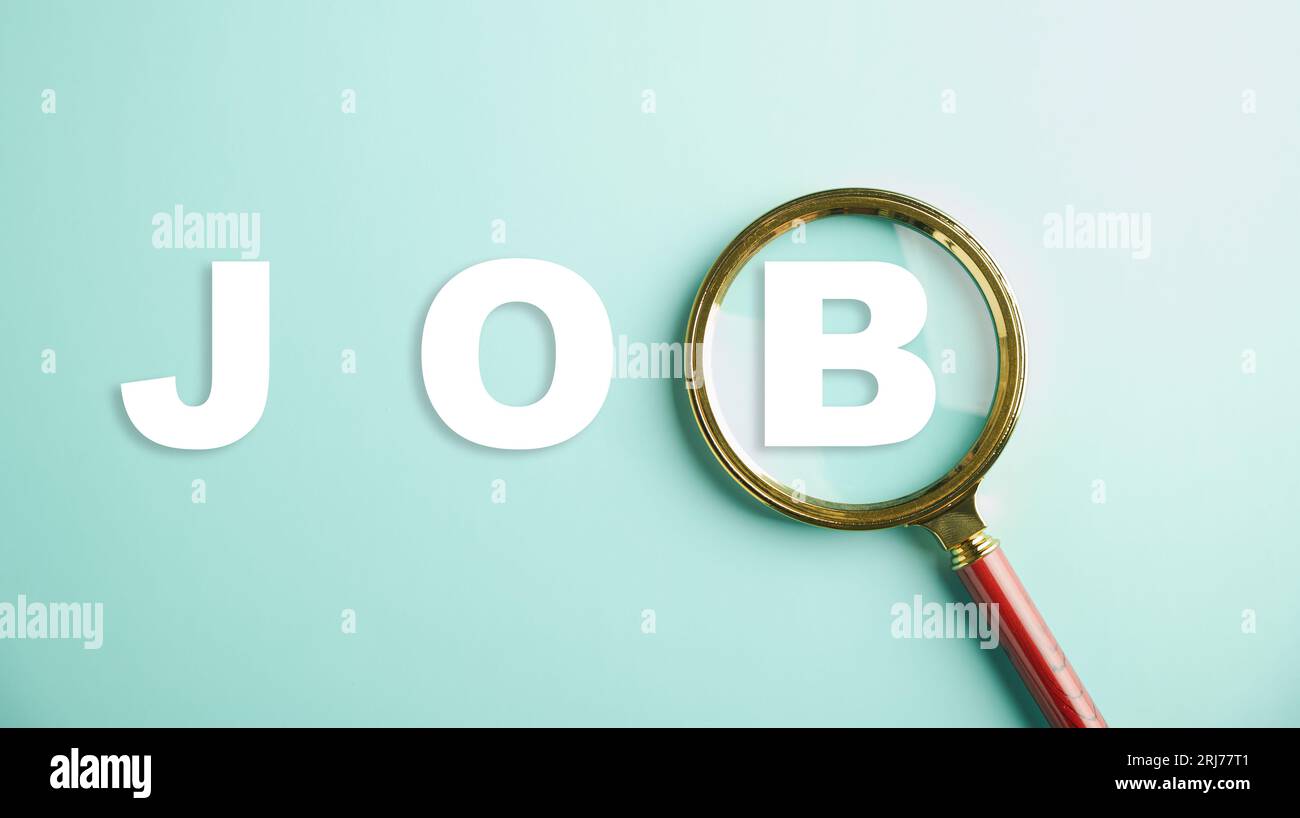 A magnifying glass focused on JOB text Stock Photo - Alamy
