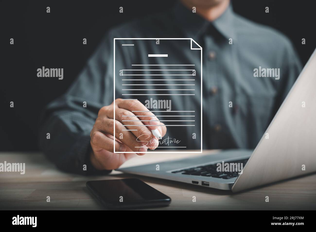 Efficient document management Businessman uses pen to sign electronic ...