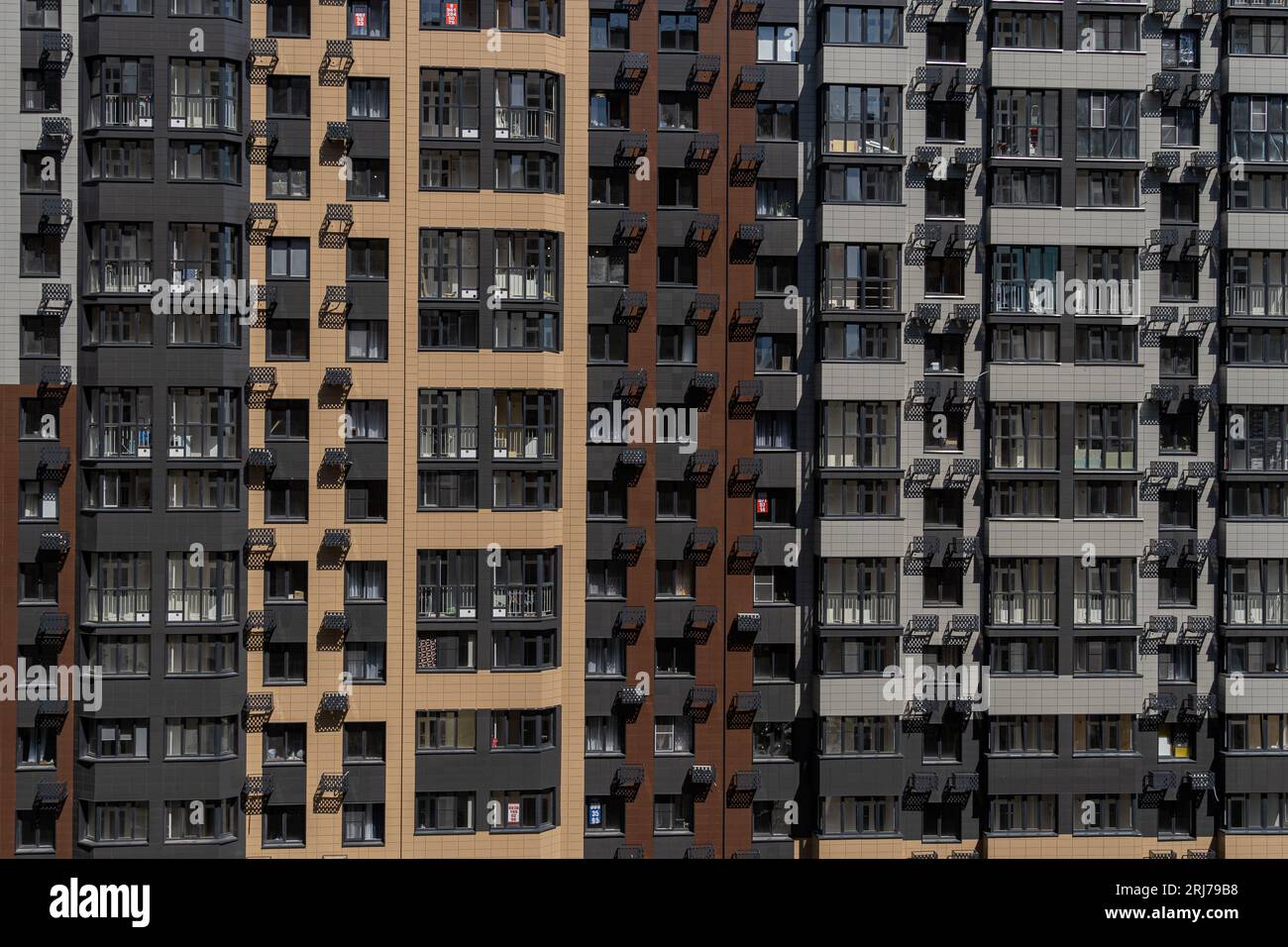 New building facade in housing complex. Modern style in architecture ...