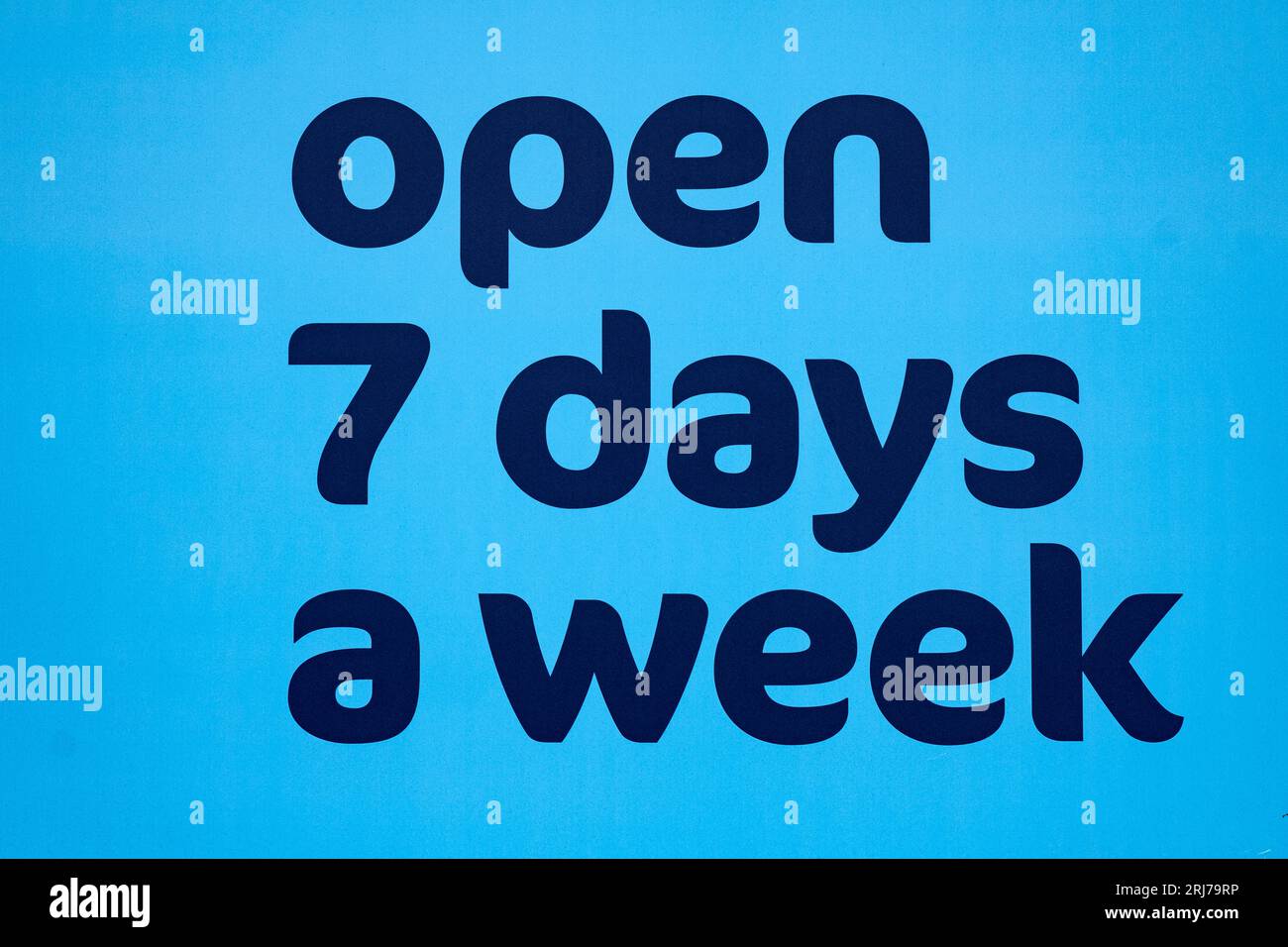 Open 7 days a week shop sign Stock Photo - Alamy