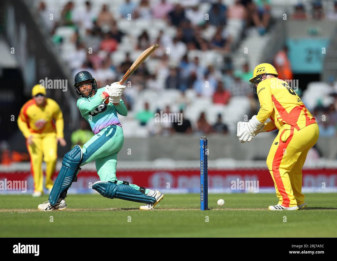 Oval Invincibles' Cordelia Griffith (left) batting during The Hundred ...