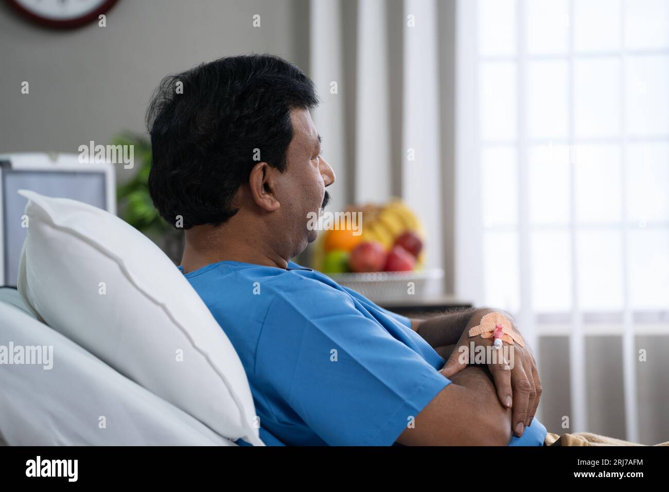 Thoughtful indian middle aged sick hi-res stock photography and images ...