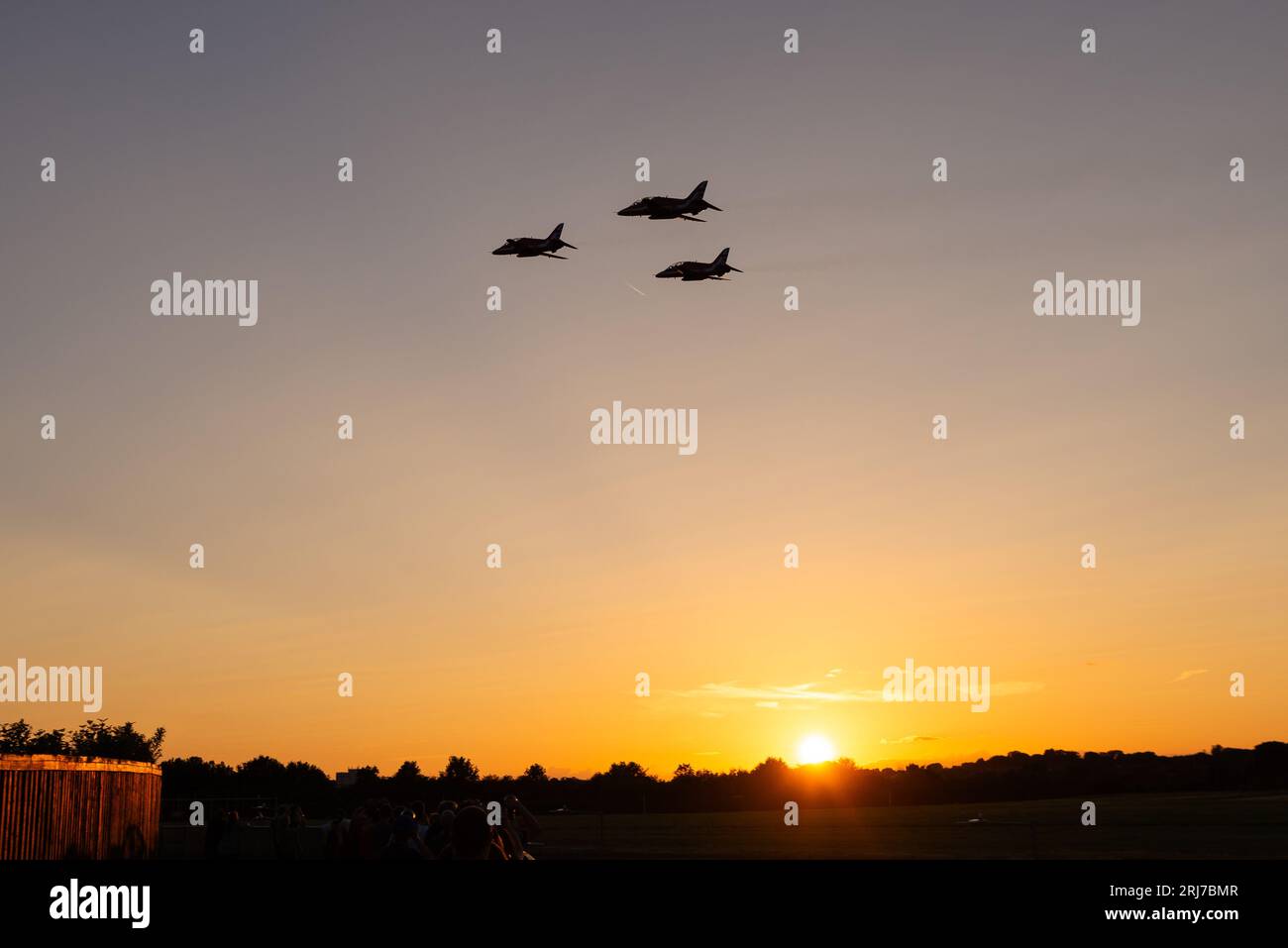 RAF Red Arrows taking off at sunset from London Southend Airport, Essex ...